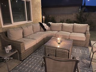 Outdoor coffee table with ottomans underneath store